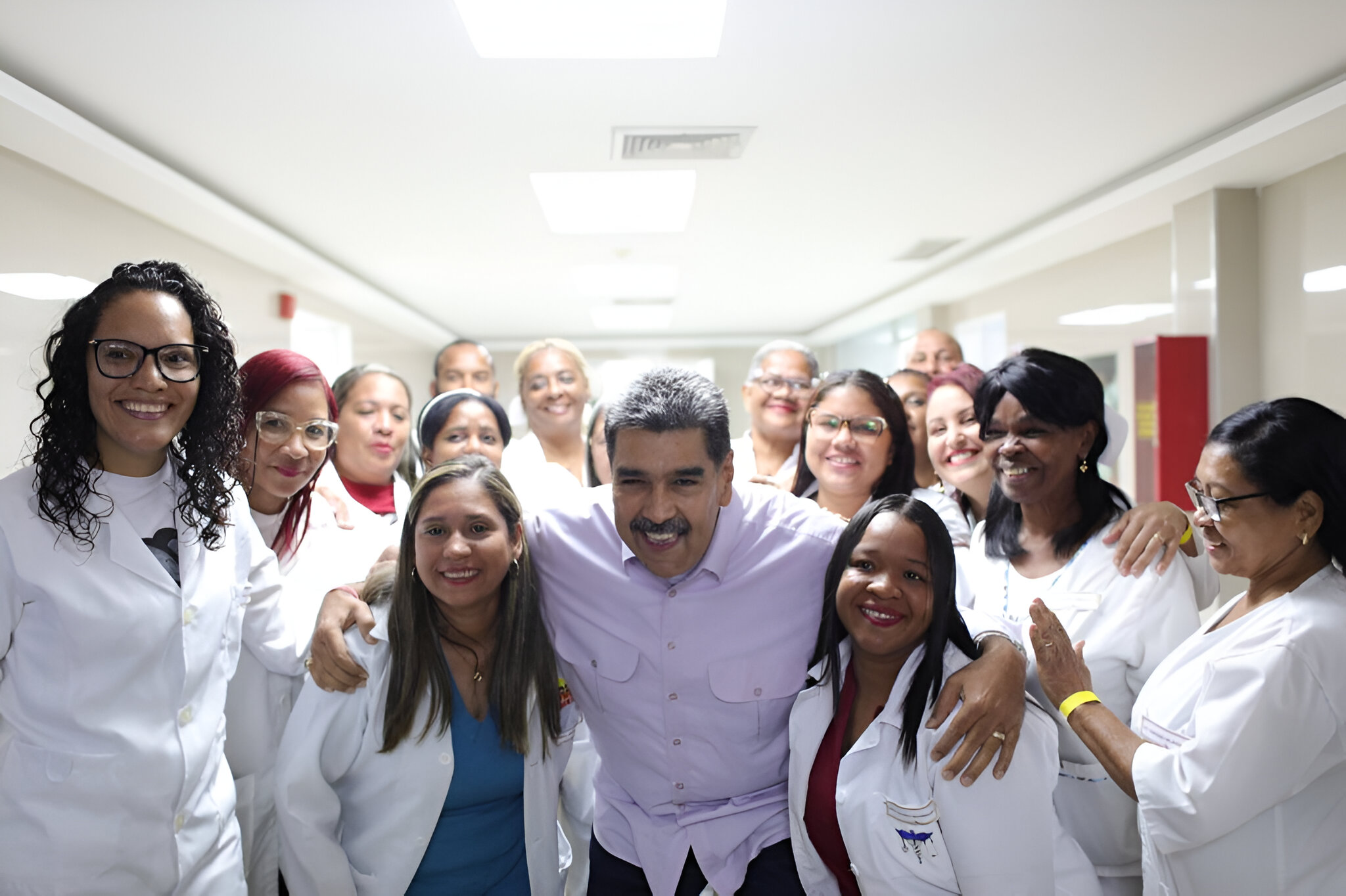 Venezuelan President Nicolas Maduro posing for a photo with medical ...