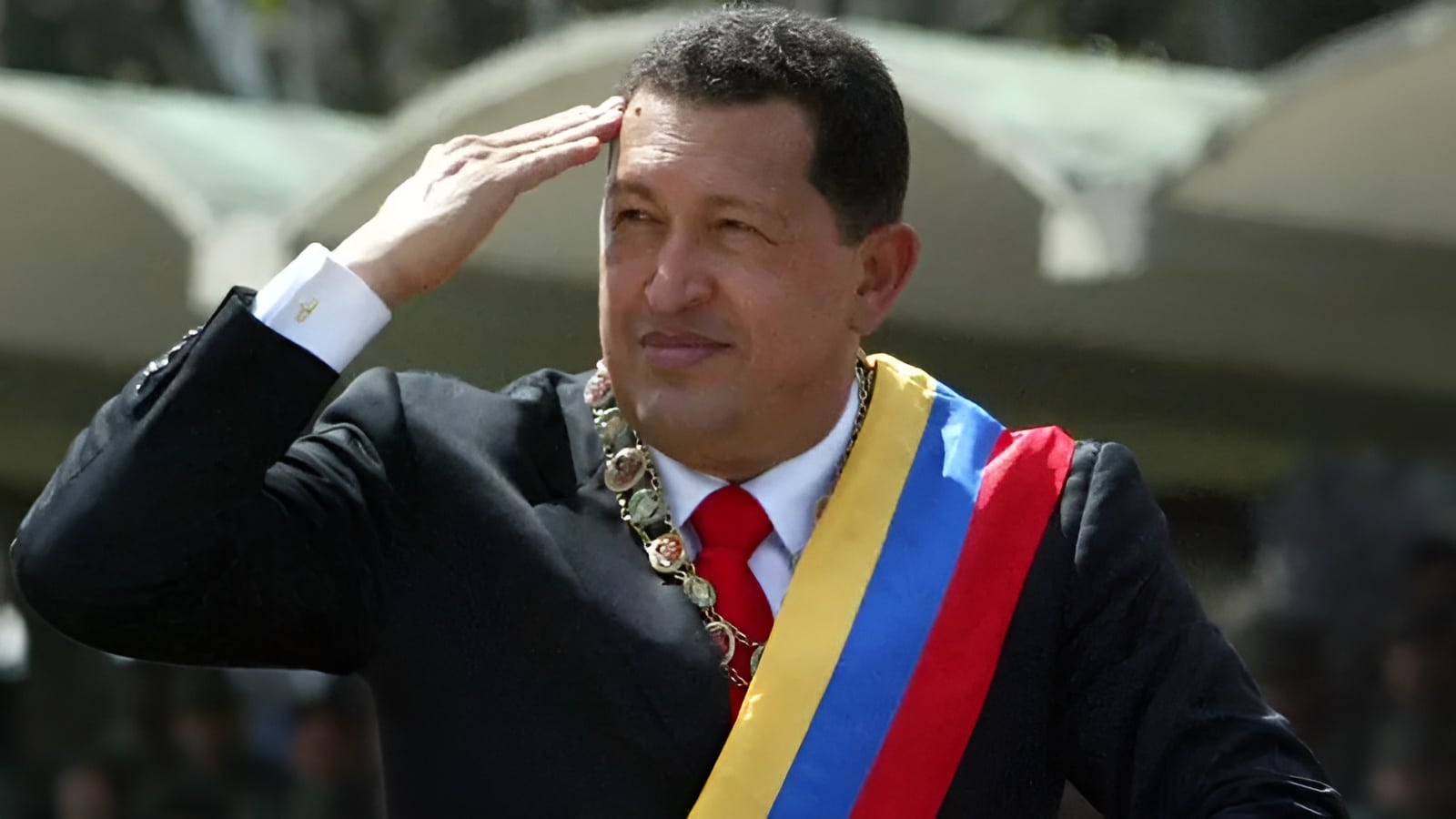 Venezuelan President Hugo CHavez leading a military parade in Caracas ...